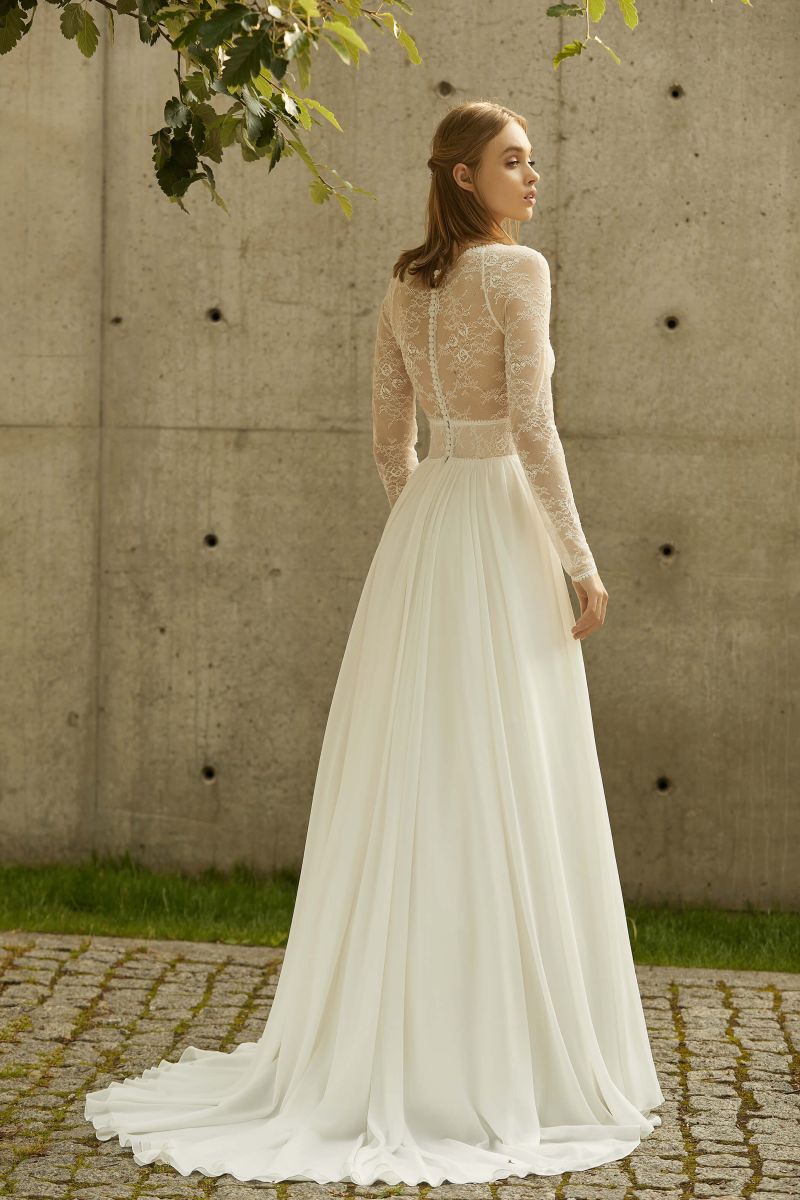 Explore long sleeved A-line dress with capped sleeves at Bride Now